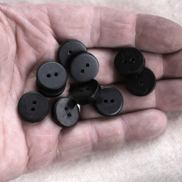 black flat buttons